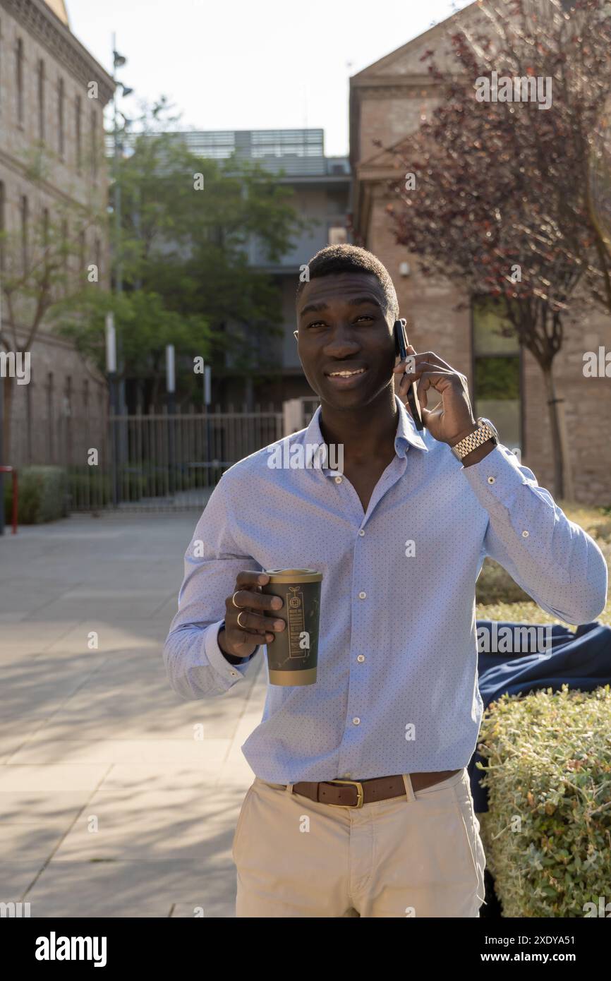 Relaxed male holding report talking hi-res stock photography and images ...