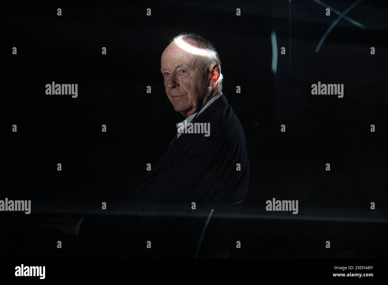 London, UK. 25 June 2024. Artist Anthony McCall in one of his immersive ...