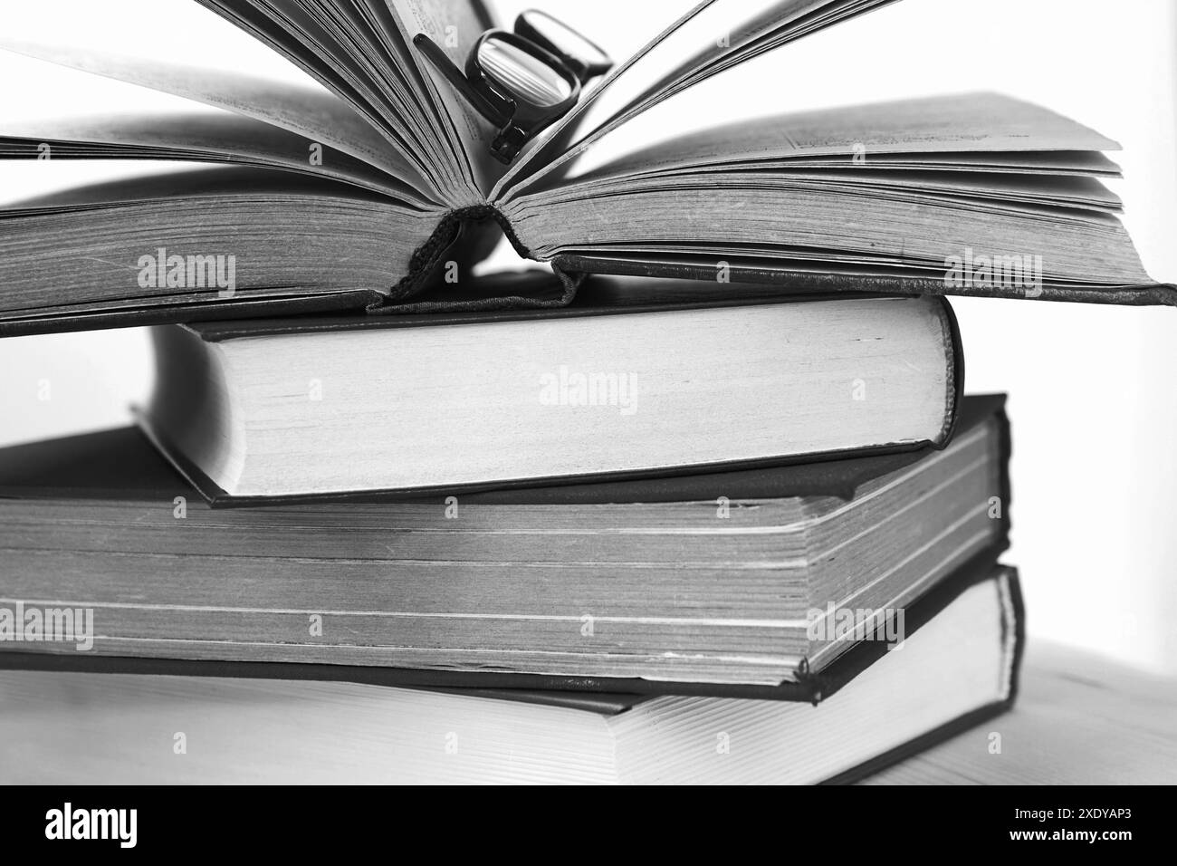 Pile of the thick books Stock Photo - Alamy
