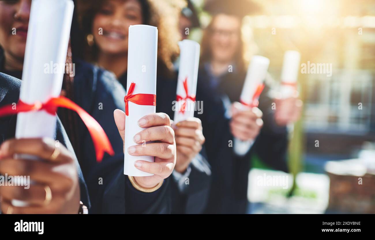Graduation, hands and students with certificate at college with ...