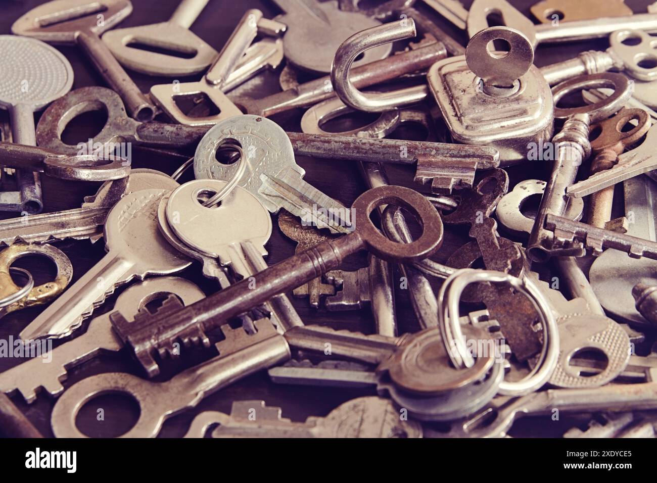 Vintage metal keys to a door and furniture Stock Photo - Alamy