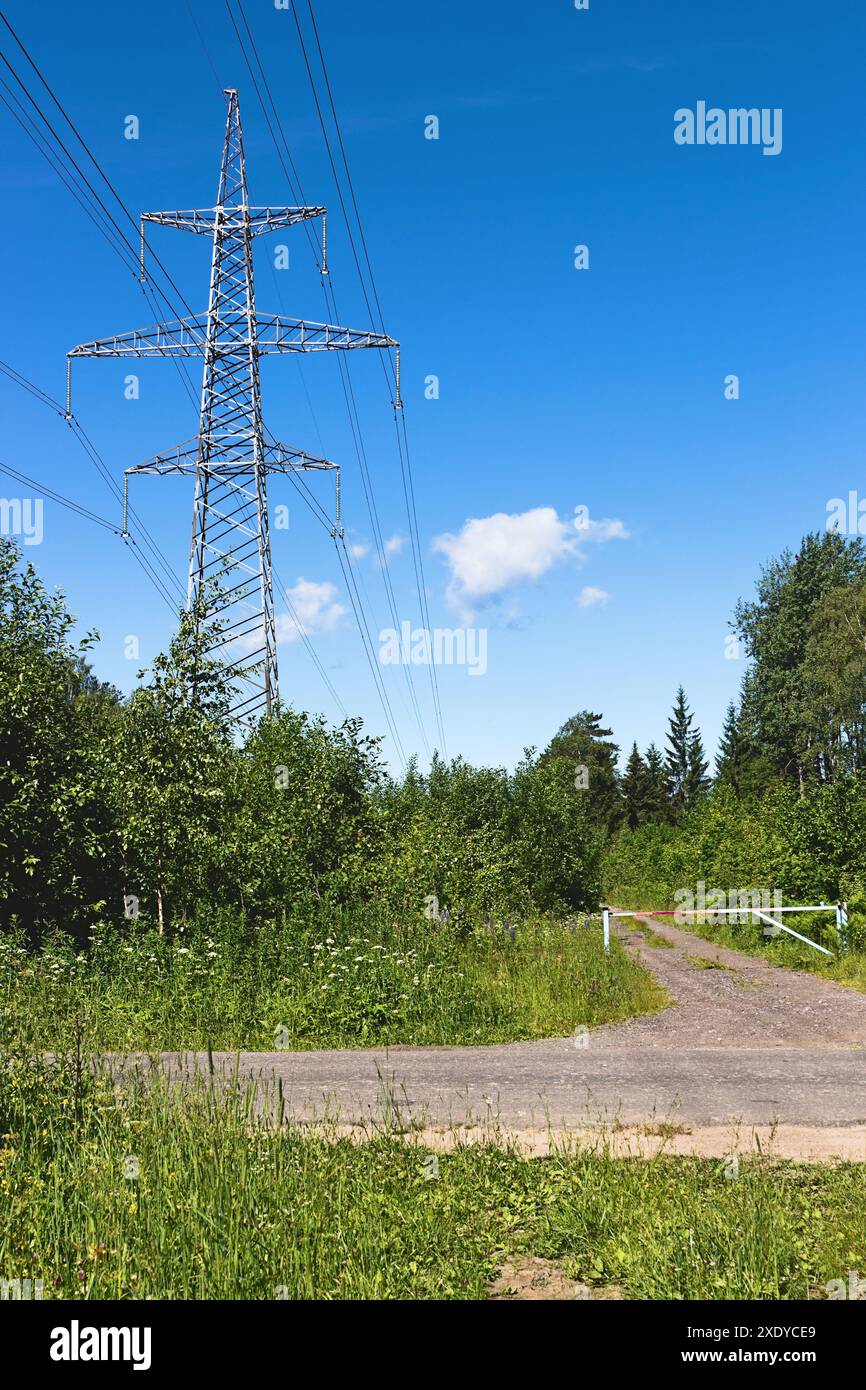 Power transmission line at the country road Stock Photo - Alamy