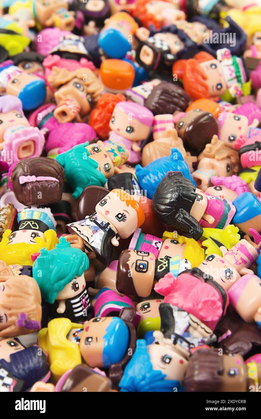Many little plastic dolls Stock Photo - Alamy