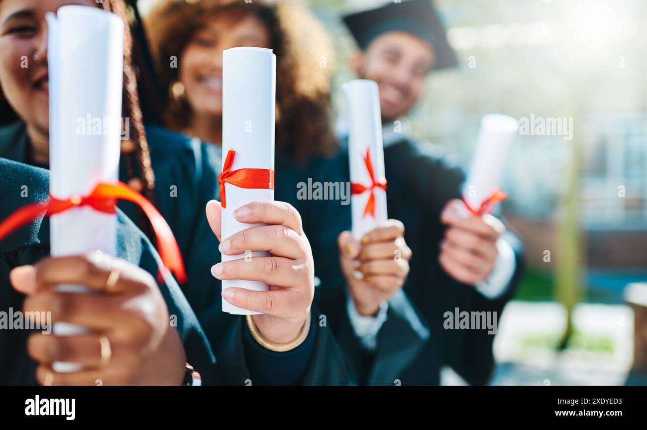 Graduation, hands and students with certificate at university with ...