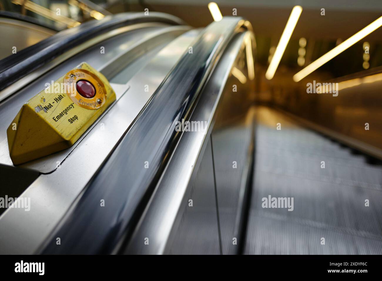 Empty escalator with emergency stop at airport frankfurt rhein main ...