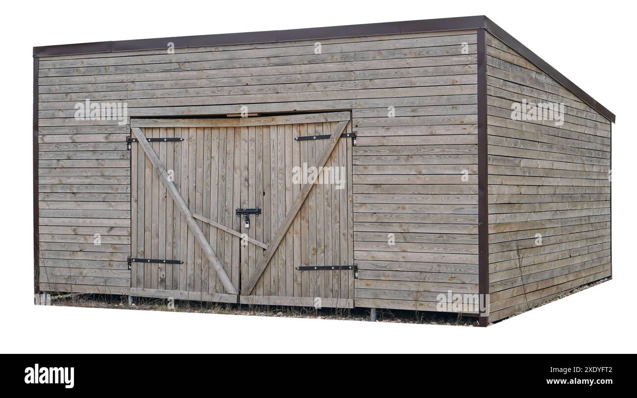 Wooden aged rural locked garage isolated Stock Photo - Alamy