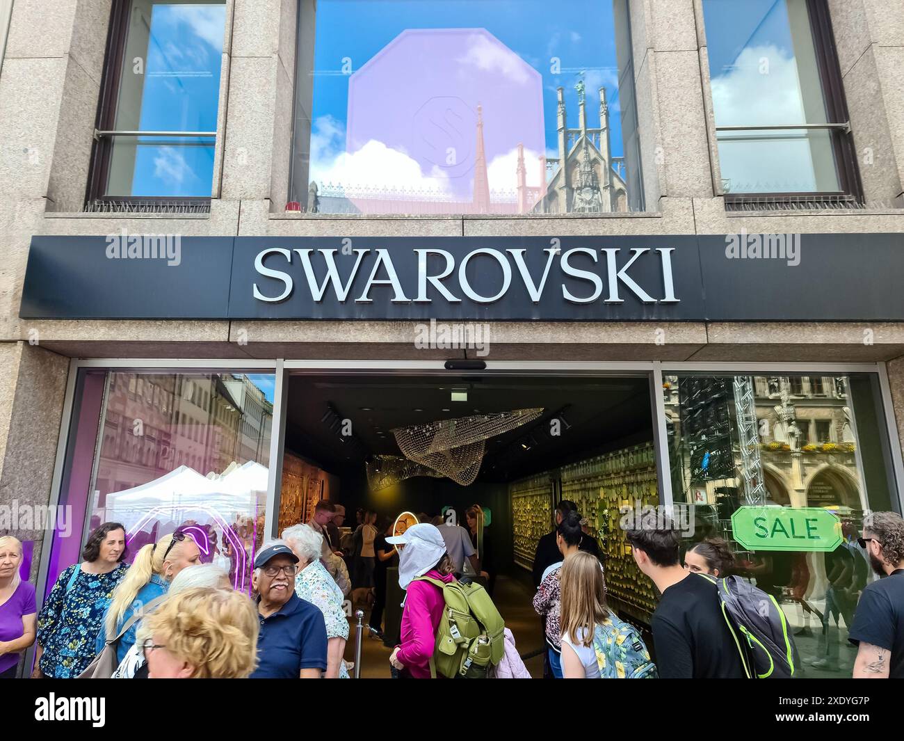 Munich, Germany - 22 June 2024: The entrance area of a Swarowski brand ...