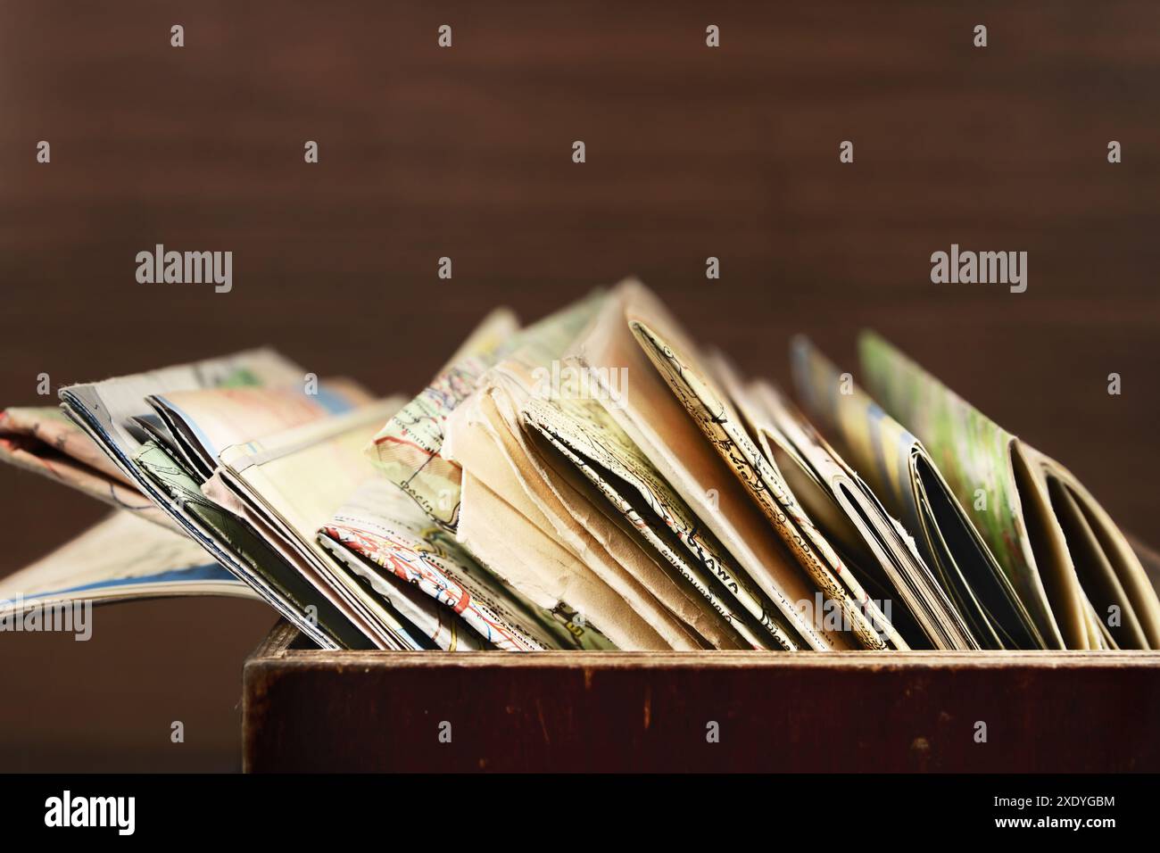 Maps of different countries in a wooden box Stock Photo - Alamy