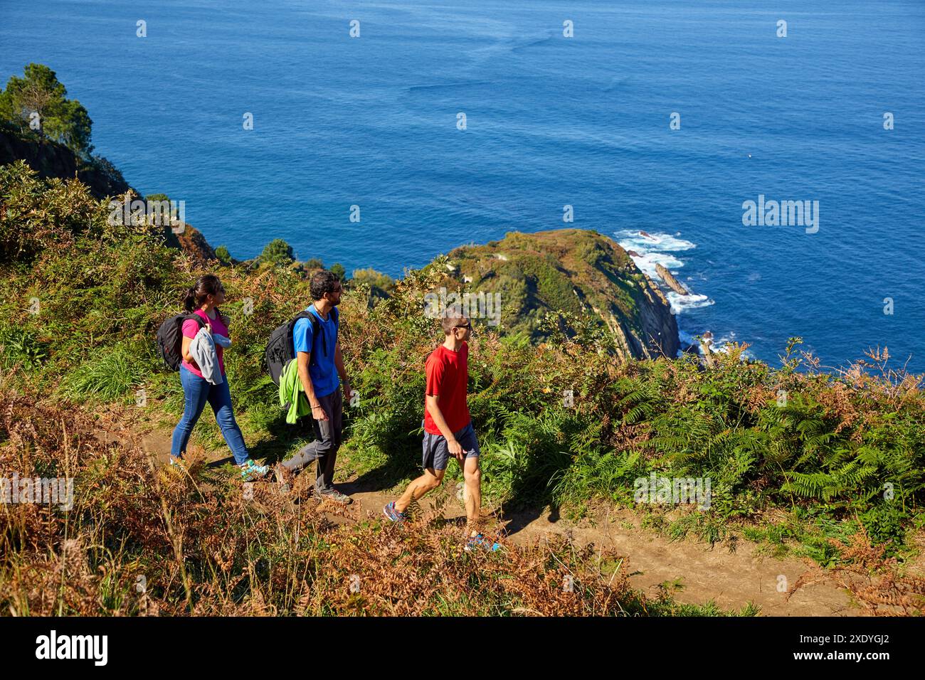 Group of tourists and guide making a tour of the Camino de Santiago, St ...