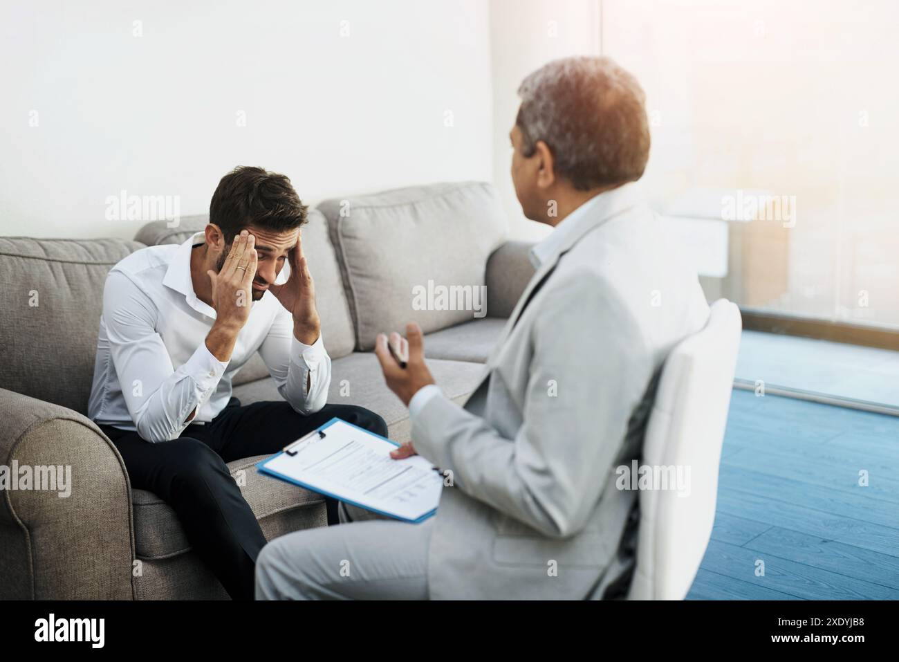 PTSD, therapy or trauma with counsellor and patient in office of ...