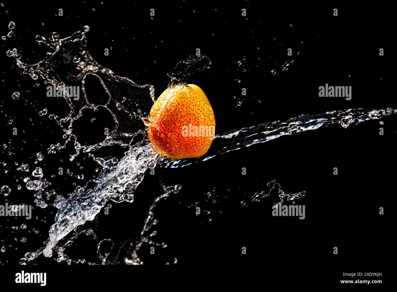 Fruit in the water jet Stock Photo - Alamy
