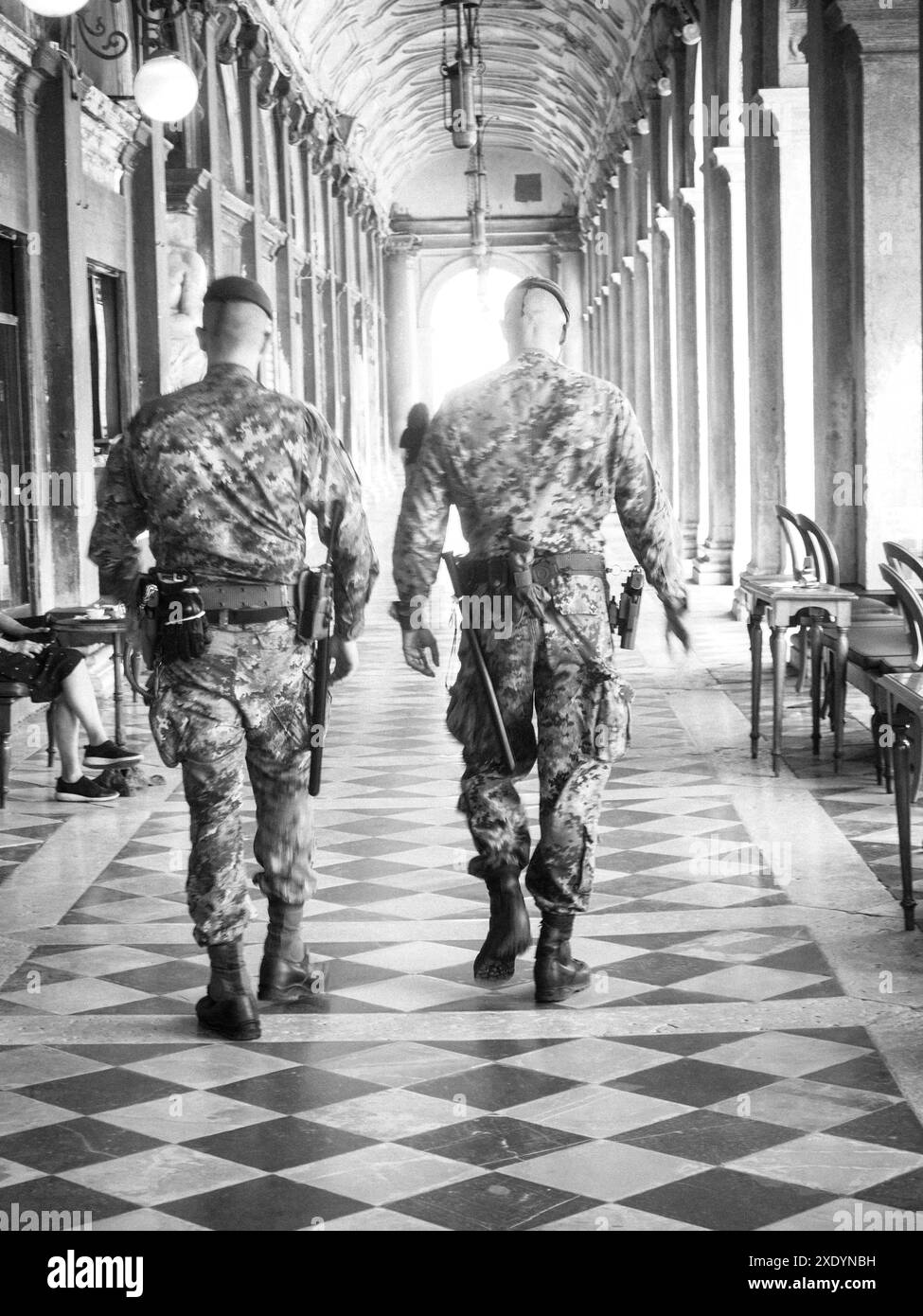 Venice, Italy - June 30th 20220 Two soldiers with camouflage uniforms ...