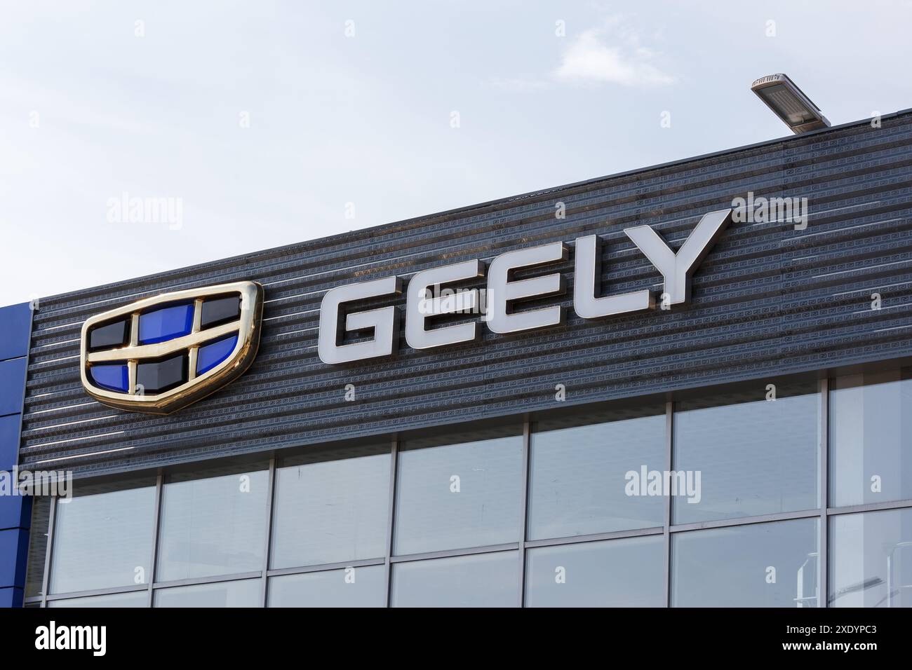 Geely logo on car dealership building at sunny day - Geely is one of ...