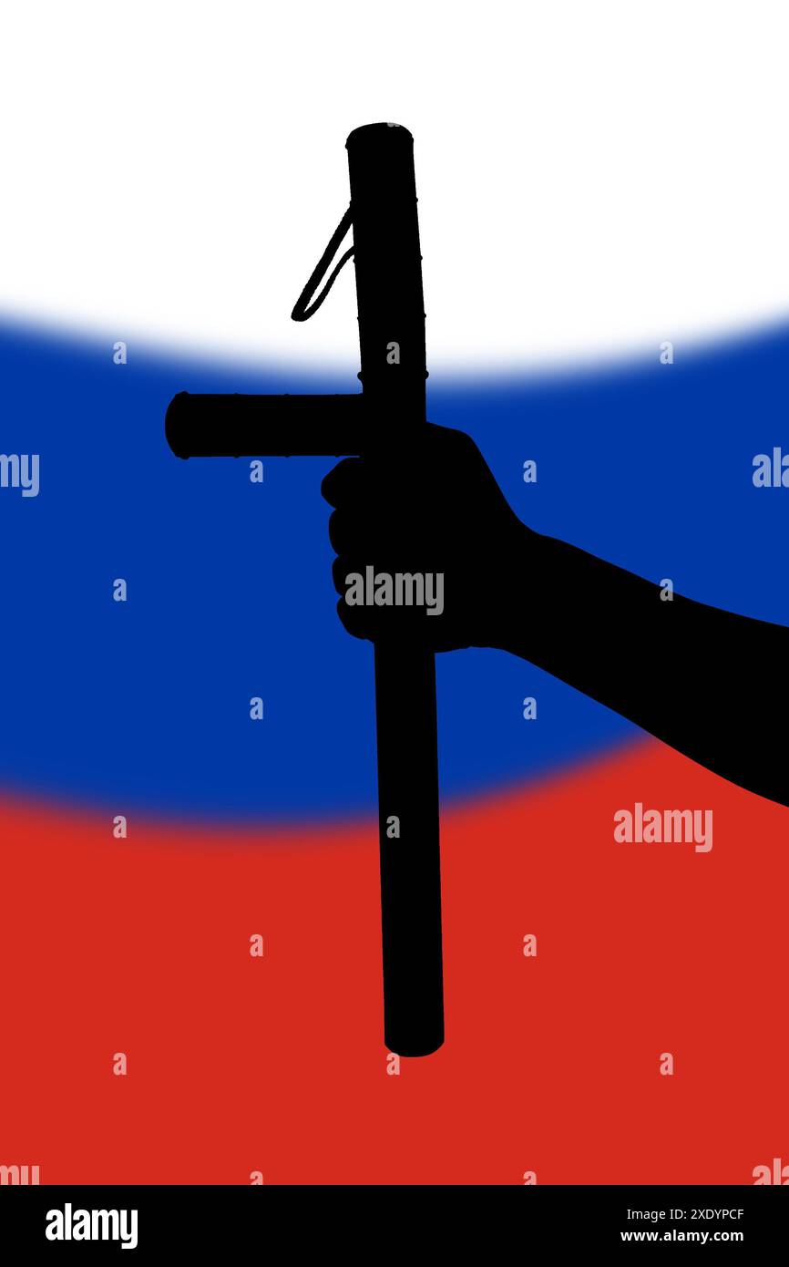 Hand with police tonfa rubber stick silhouette and blurry russian flag ...
