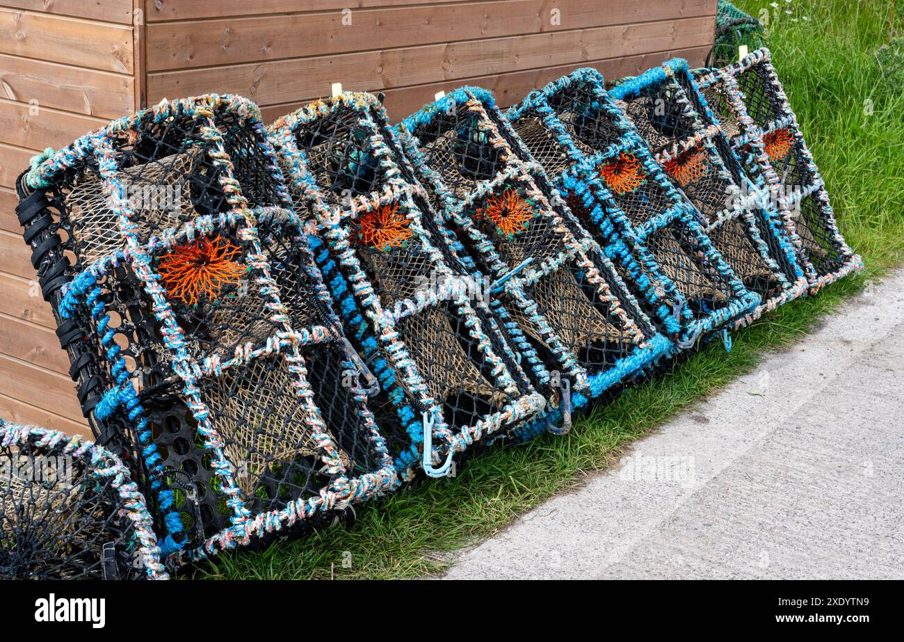 Six colourful and good condition Creel, lobster, crab pots stacked ...