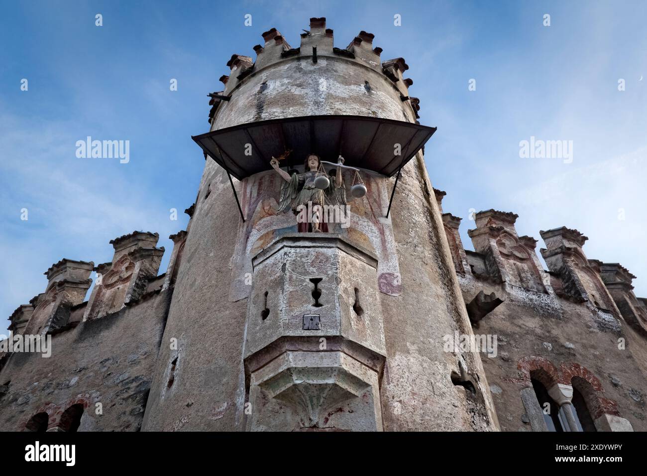 Novacella Abbey: cylindrical tower with sculpture of the Romanesque ...