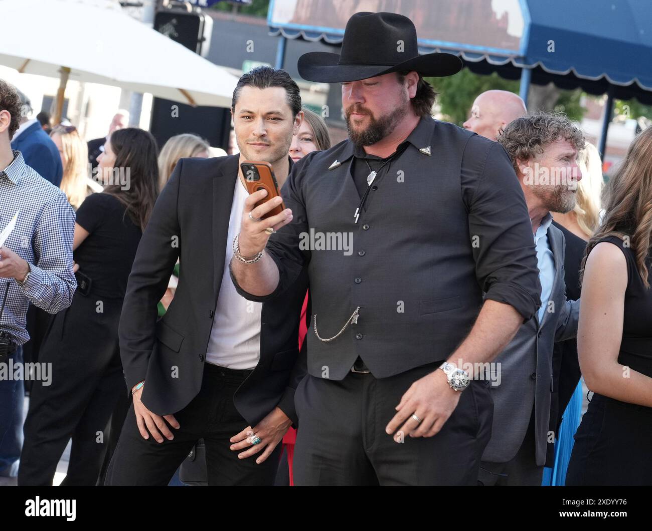 (L-R) Blair Redford and Tanner Beard at the HORIZON: AN AMERICAN SAGA ...