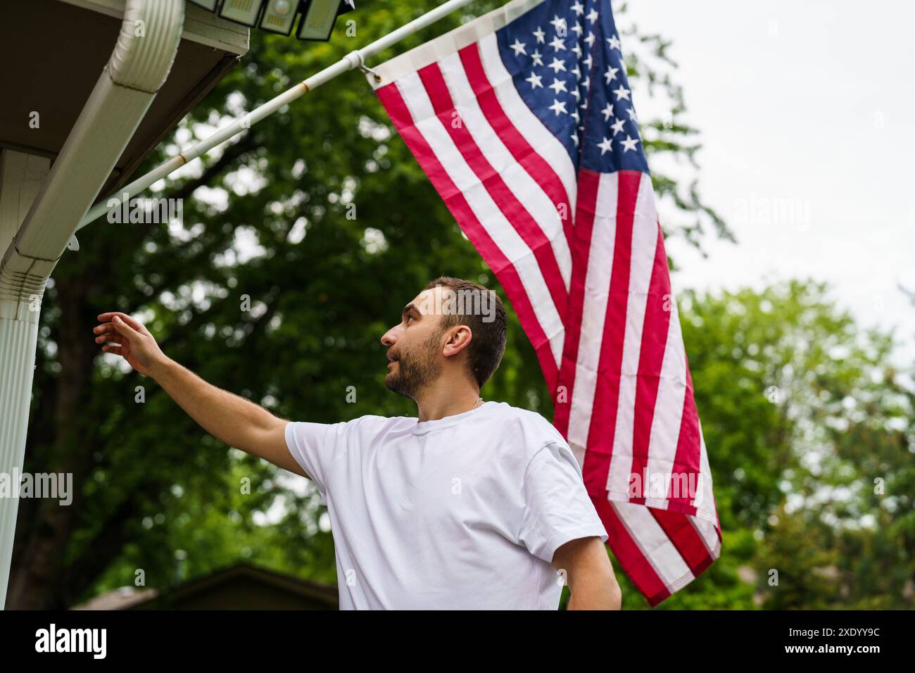Proud American Homeowner Flying the United States of America National ...