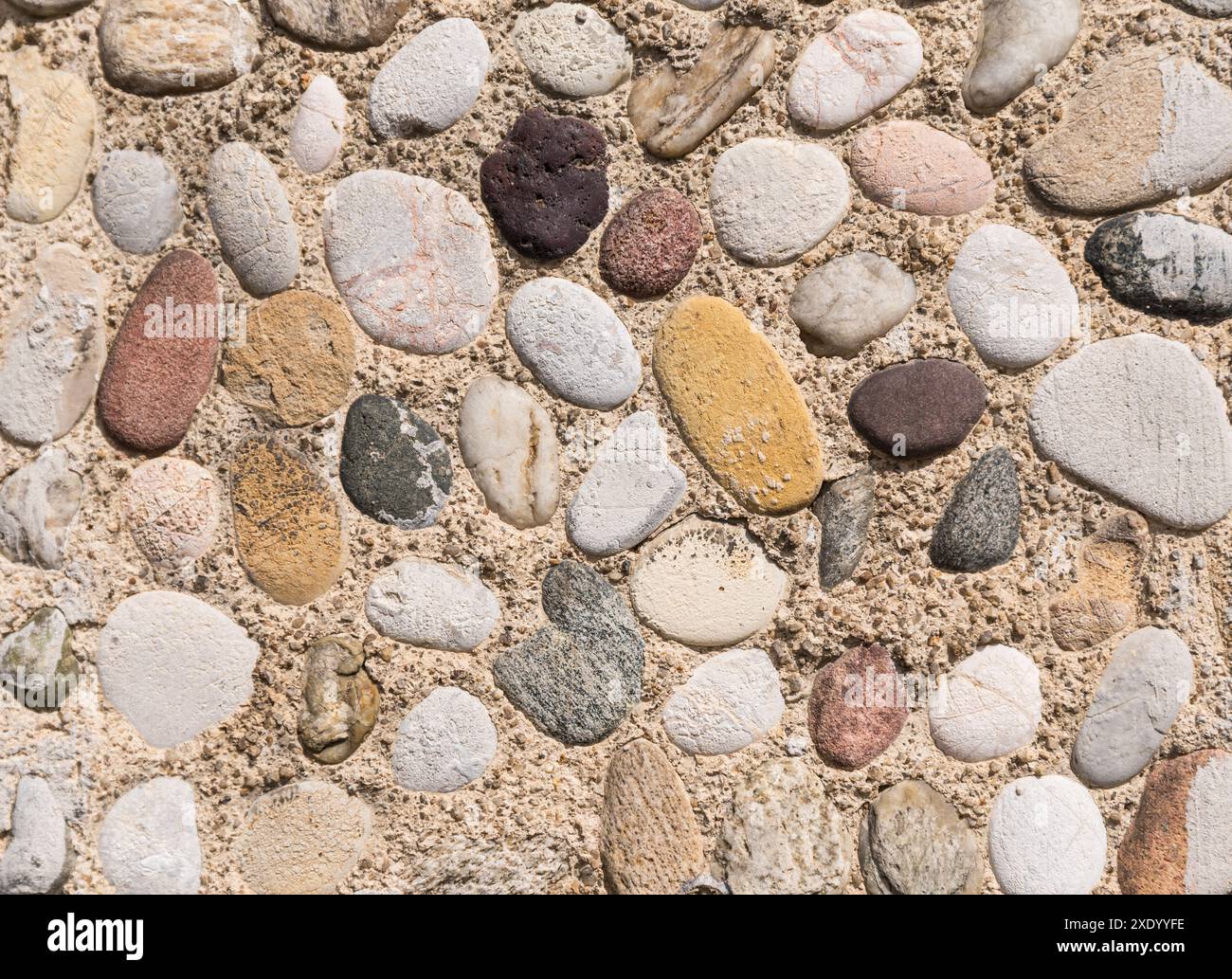 Background with a wall of multi-colored pebbles - mosaic Stock Photo ...