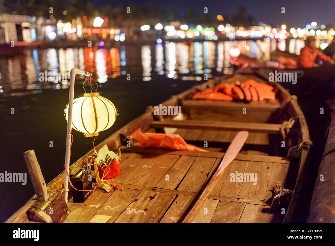 Awesome night view of traditional wooden Vietnamese boat decorated with ...