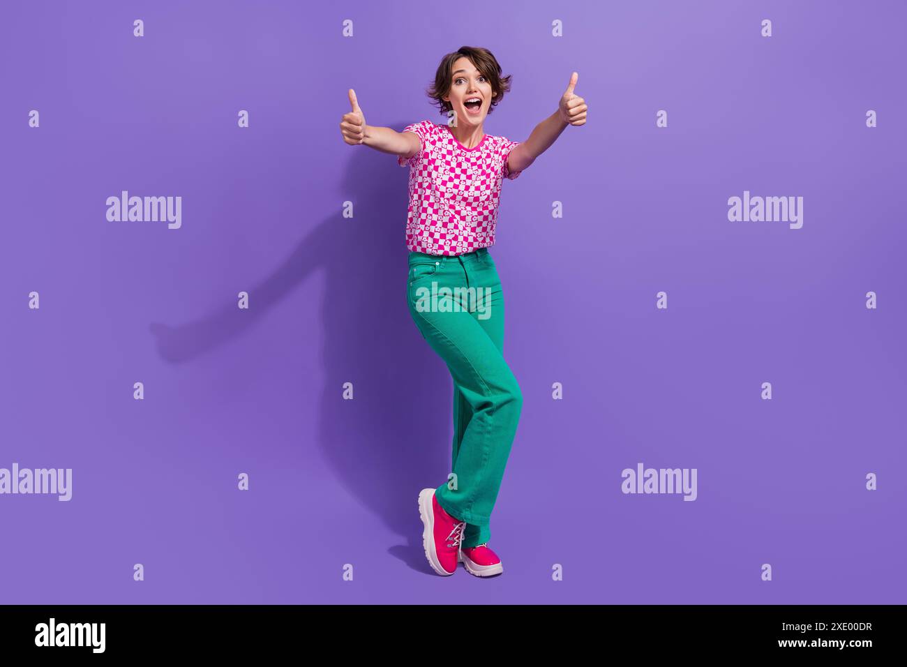 Full size photo of pretty young girl show excited double thumb up wear ...