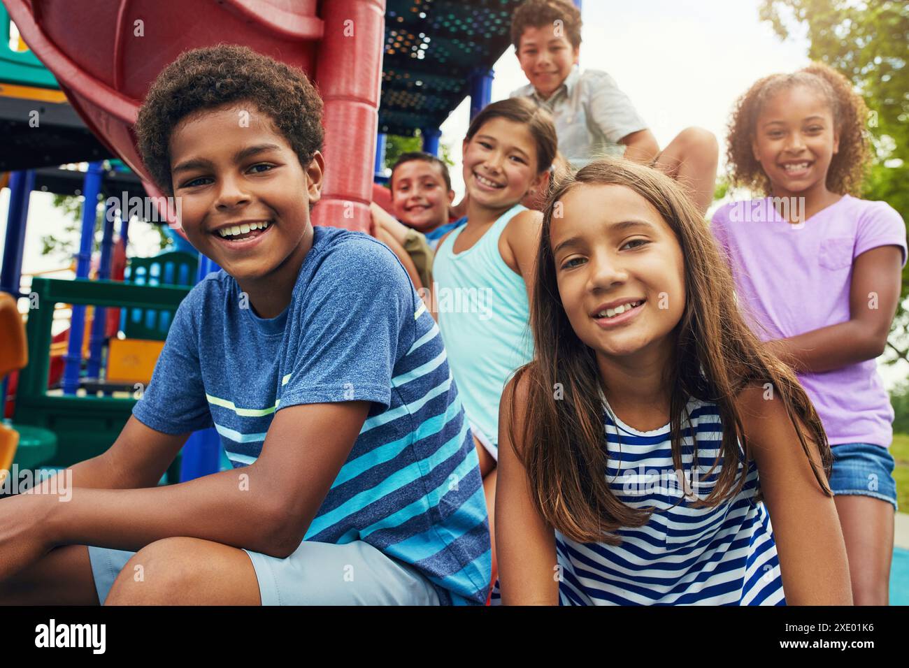 Portrait, friends and kids with smile, playground and happiness with ...