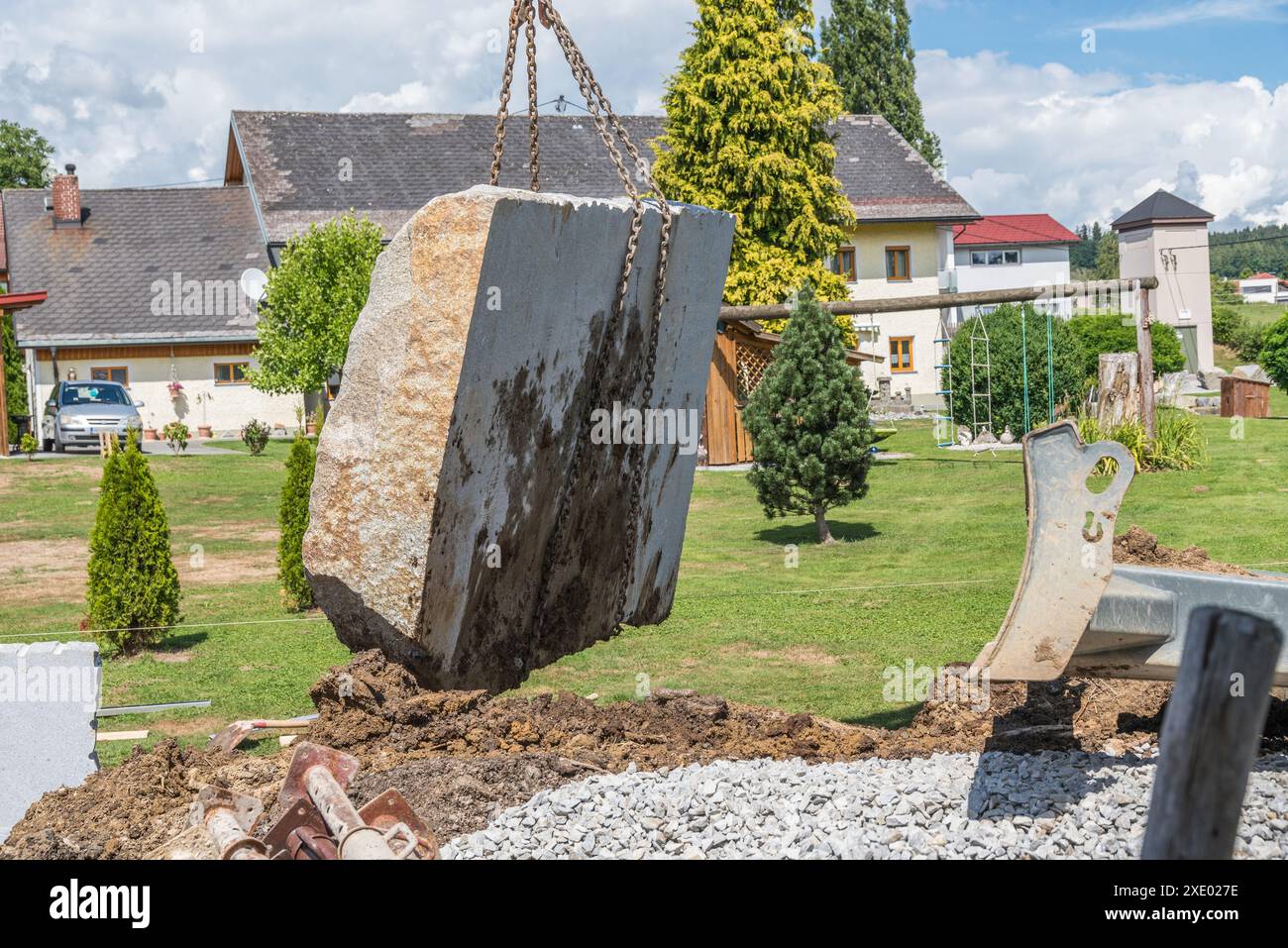 Granite natural stone with construction crane on construction site ...