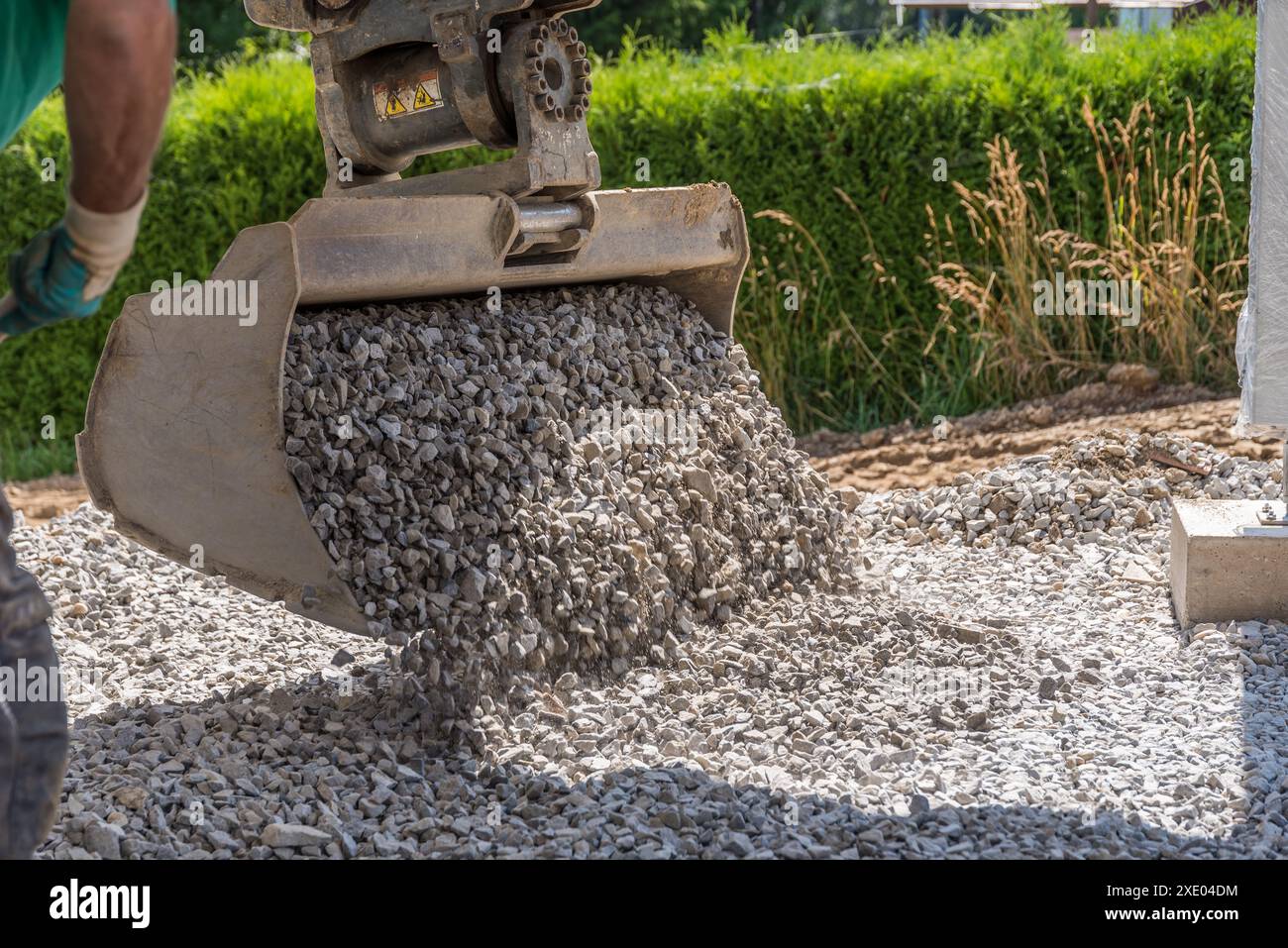 Excavator bucket with crushed stone - construction industry ...