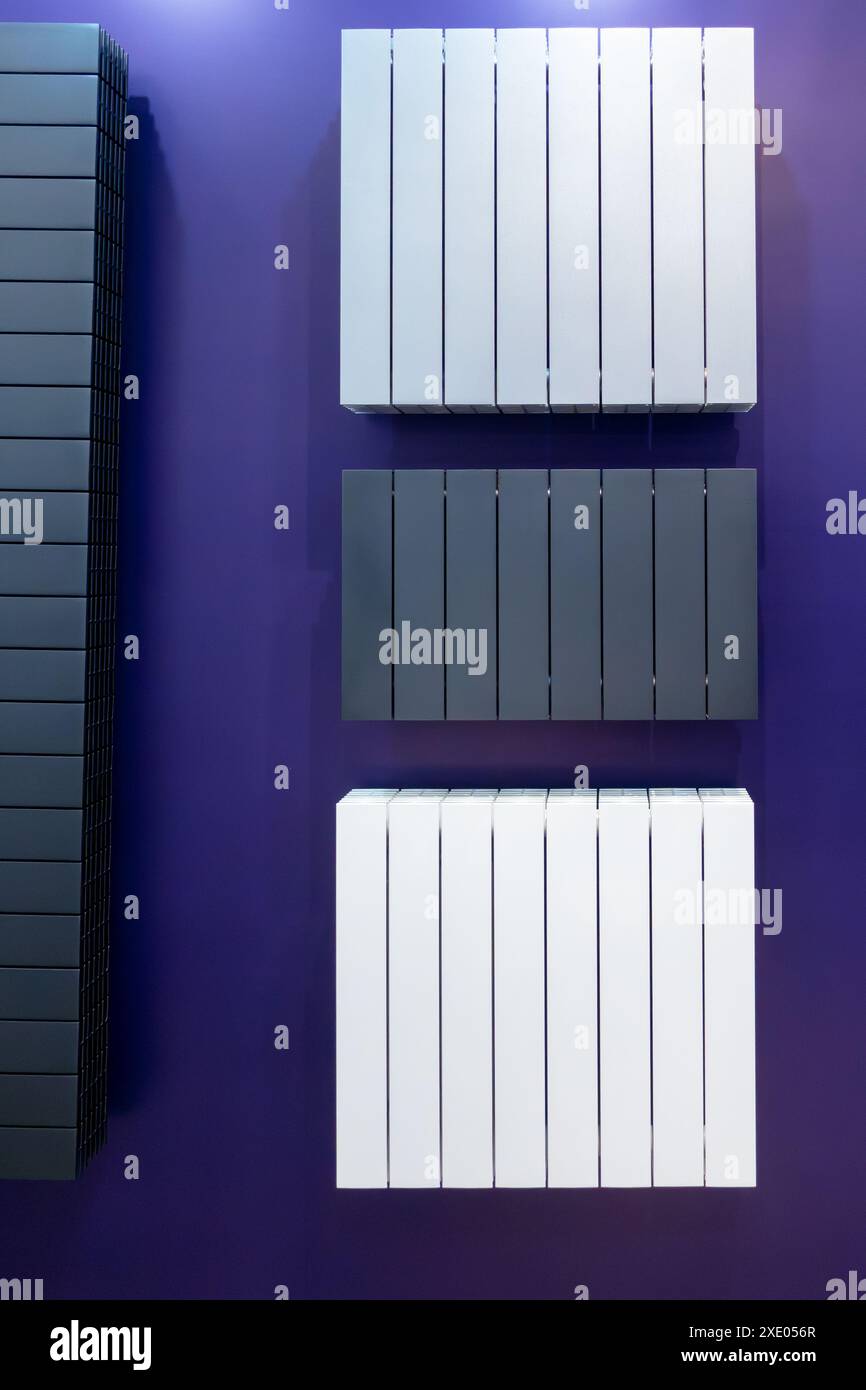 Flat wall radiators of heating gray and white Stock Photo - Alamy