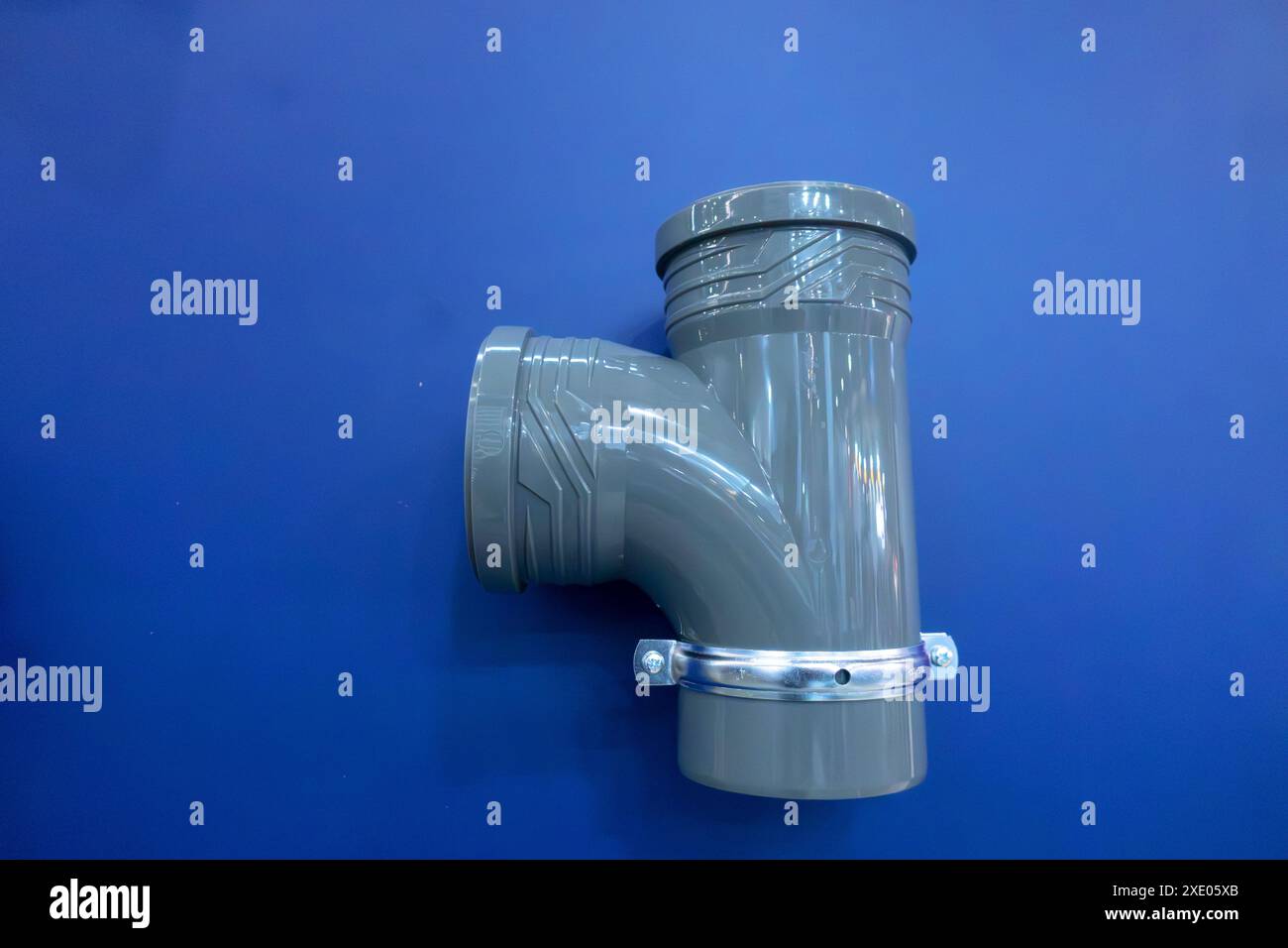 Gray plastic fitting, which is a component of the plumbing system. It ...