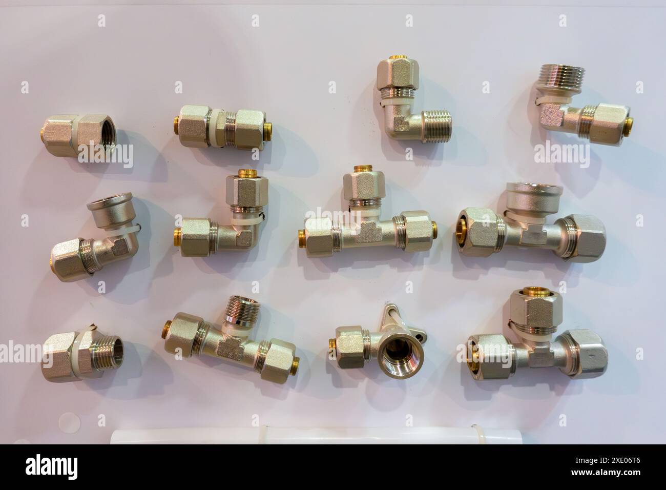 Crimping fitting system for plastic pipes Stock Photo - Alamy