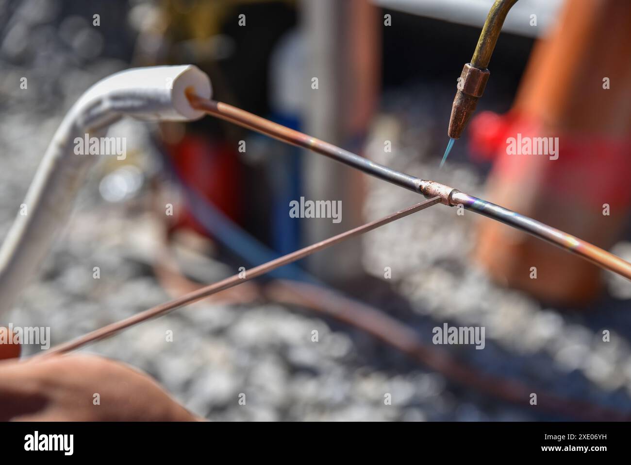 Craftsman brazing copper pipe - welding Stock Photo - Alamy