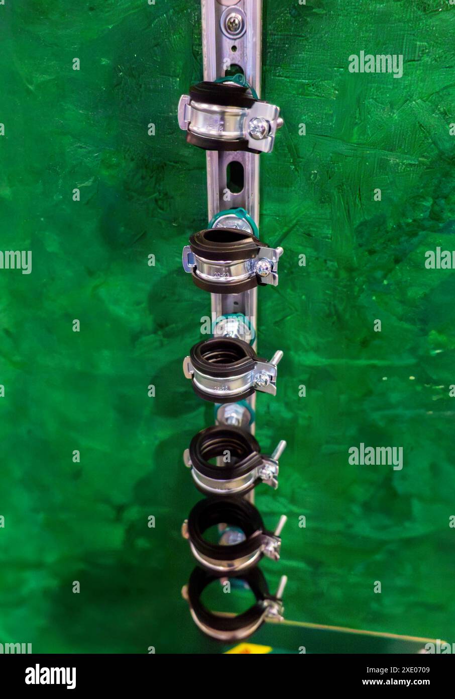 Fastening system. Double-screw pipe clamp with a locking ring Stock ...