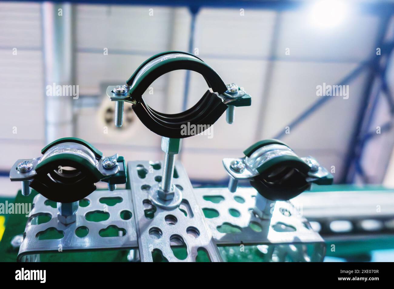 Fastening system. Double-screw pipe clamp with a locking ring Stock ...