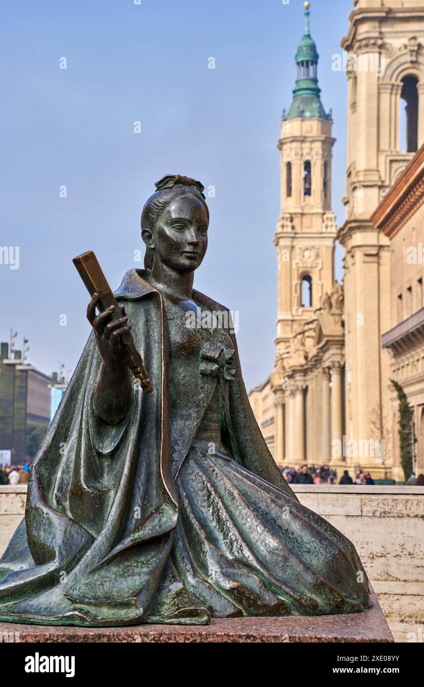 Female figure in 18th century clothes, bronze statue in the monument to ...