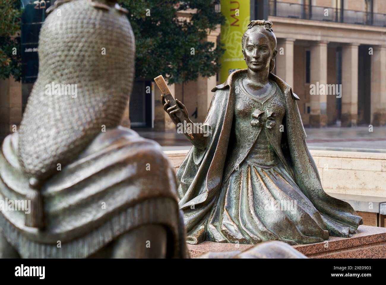 Female figure in 18th century clothes, bronze statue in the monument to ...