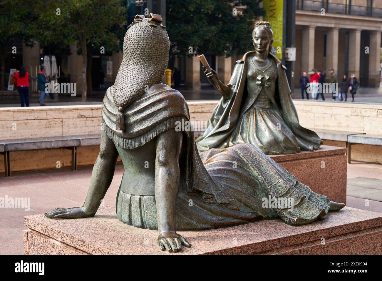 Female figure in 18th century clothes, bronze statue in the monument to ...