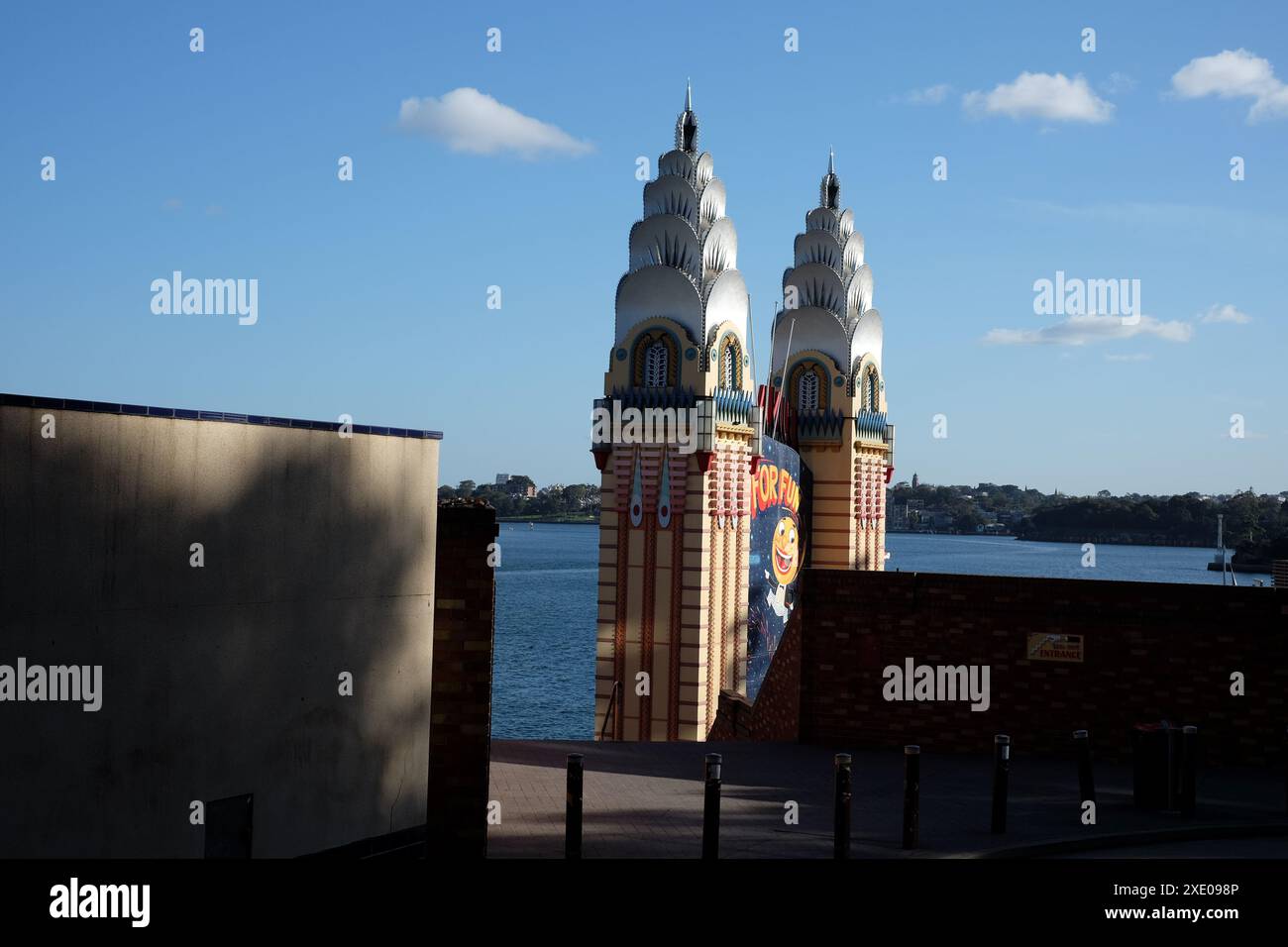 Blue water of Sydney Harbour and the entrance of Luna Park featuring it ...