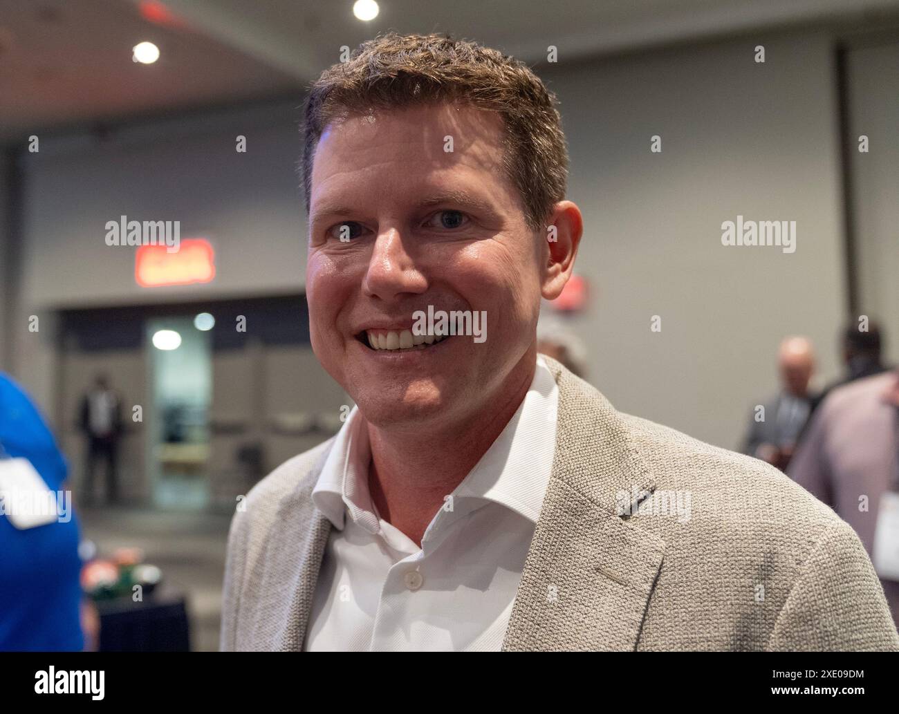 Whole Foods CEO Jason Buechel poses after keynote conversation with ...
