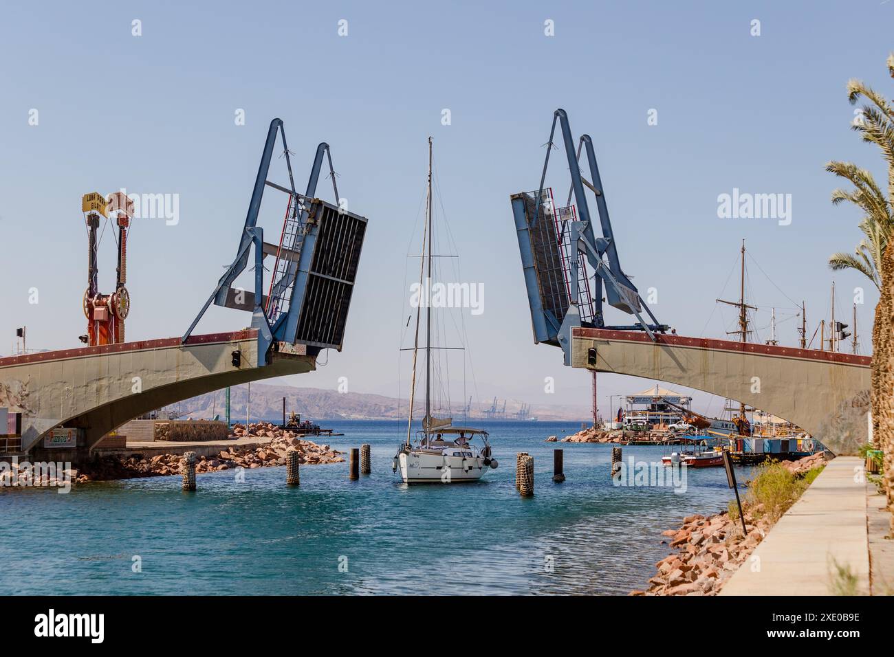 The drawbridge opens to let the boat to pass through Stock Photo - Alamy