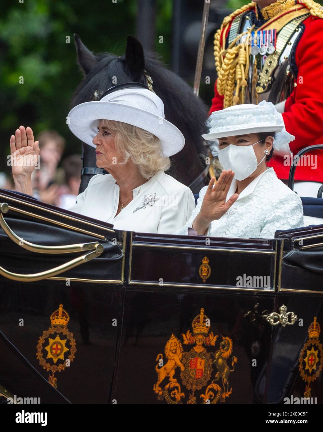 London, UK. 25 June 2024. (R) The Empress of Japan rides in a Semi ...
