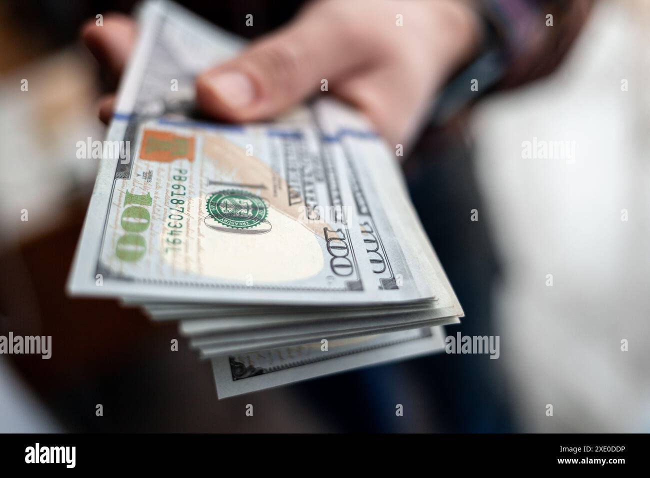 Male hand giving money hi-res stock photography and images - Alamy