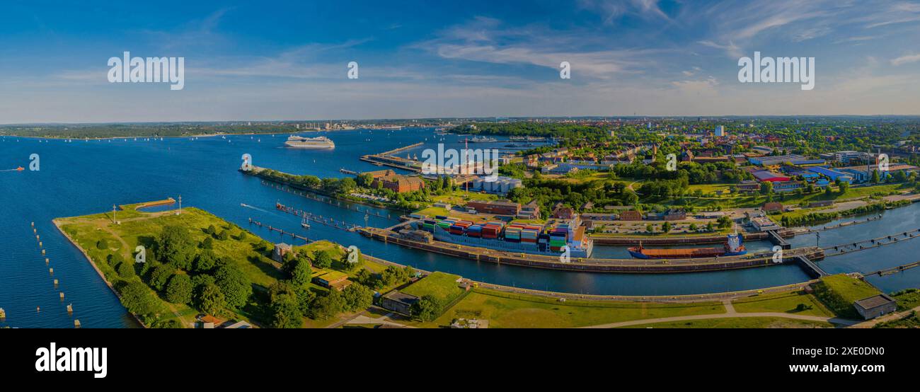 Panorama view of the Kiel Canal waterway with lockage Holtenau. Cargo ...