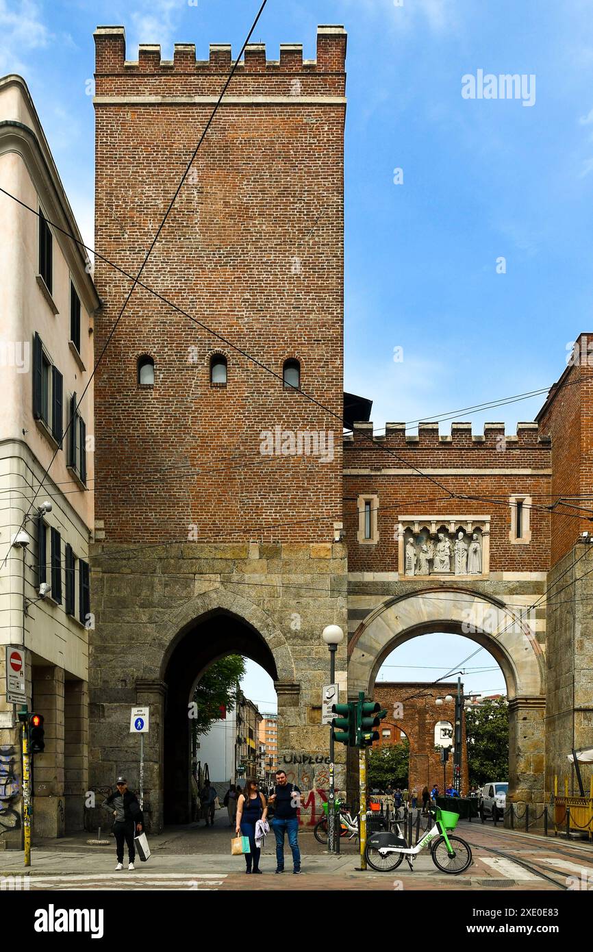 The Medieval Porta Ticinese, ancient city gate, with people in spring ...