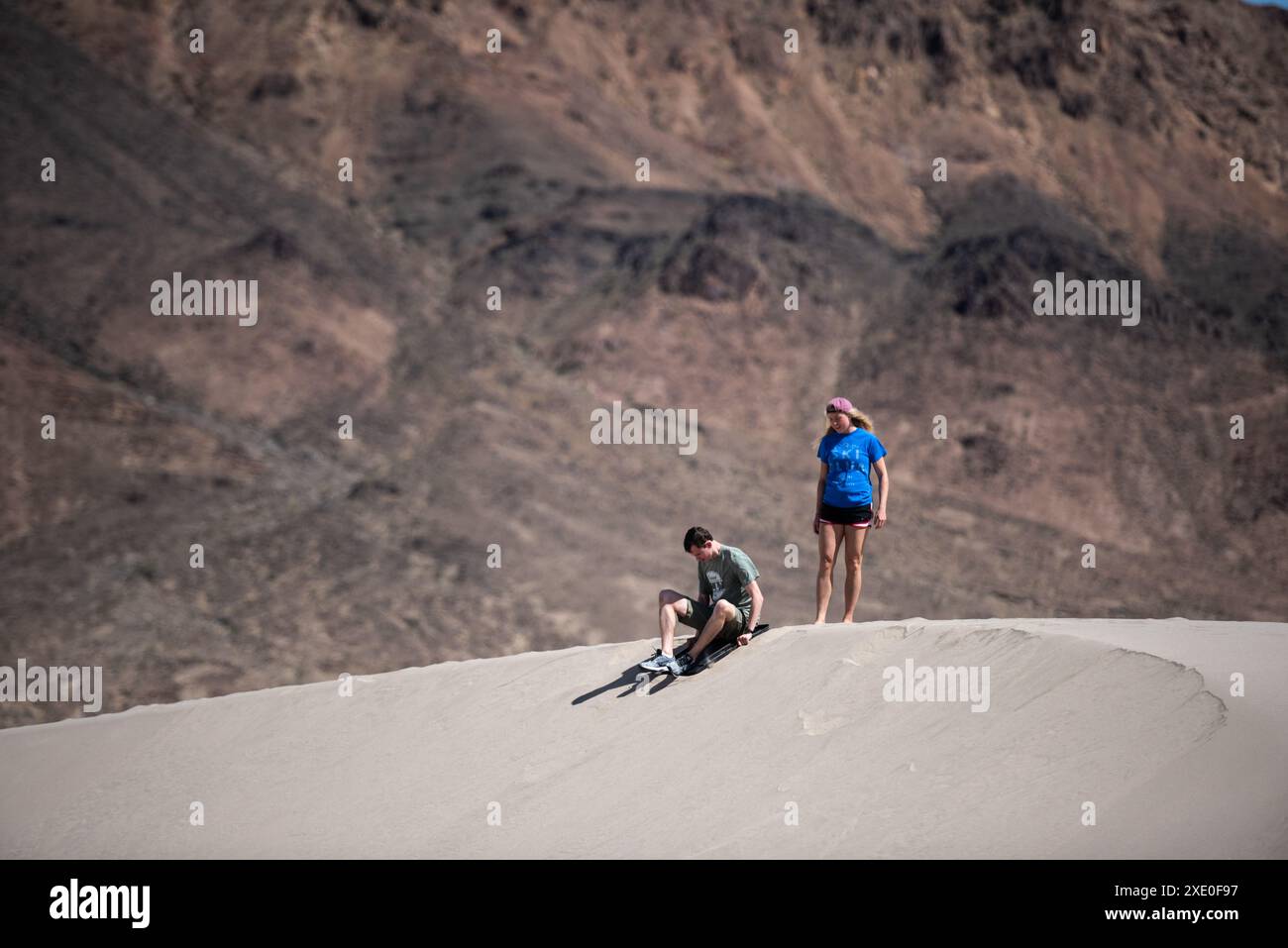 Sledding on sand at Dumont Dunes Off-Highway Vehicle (OHV) Area Stock ...