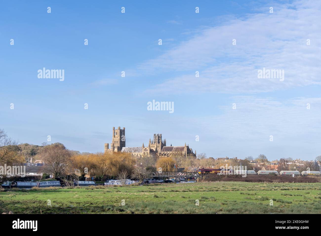 An east midlands intercity train passes in front of Ely Cathedral under ...