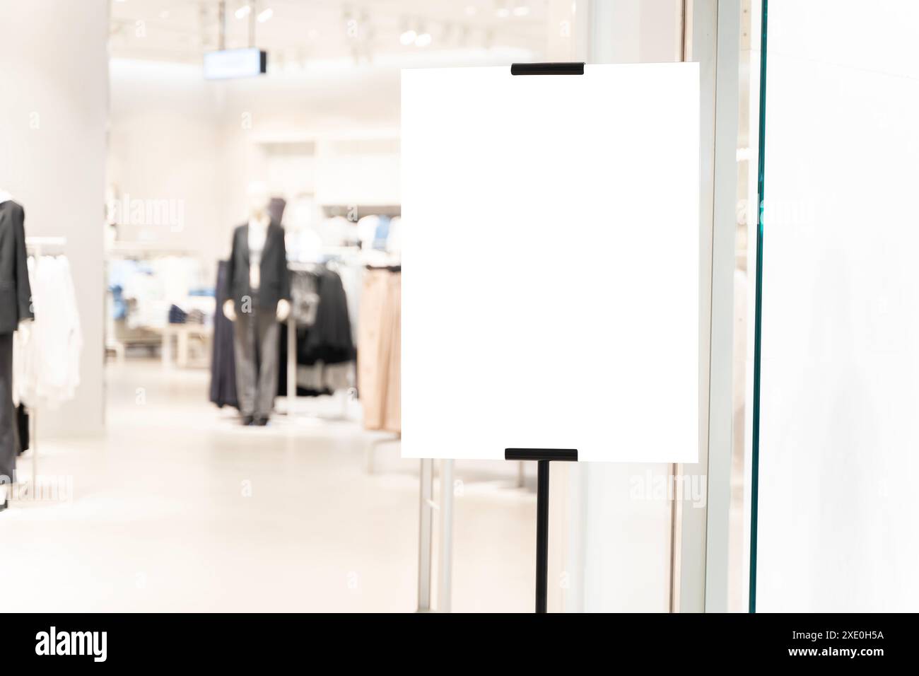 Sale sign fashion retail shop store in shopping mall. Vertical white ...