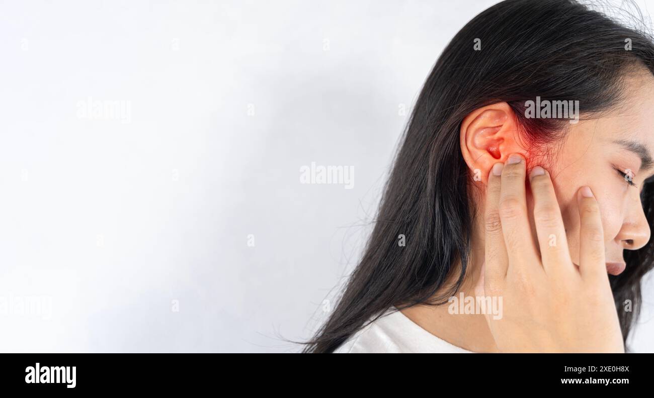 Young woman with sore ear, suffering from otitis, black and white ...