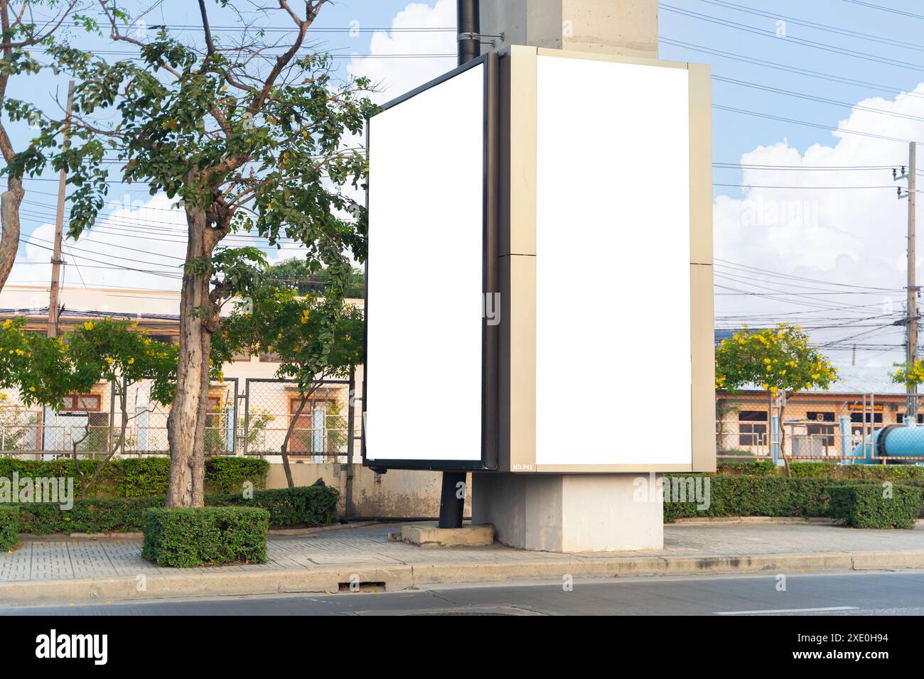 Vertical billboard for displaying commercials in street. Cars and ...