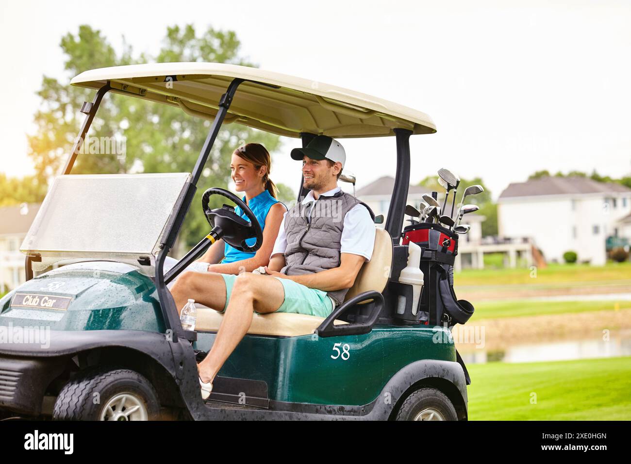 People, golf cart and outside course in nature, happy and relax in ...